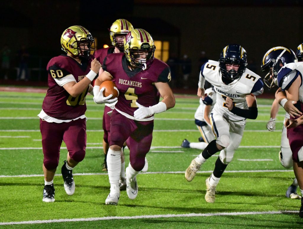 Pulling away: Bucs ride strong finish to win over Mikes - Herald-Standard